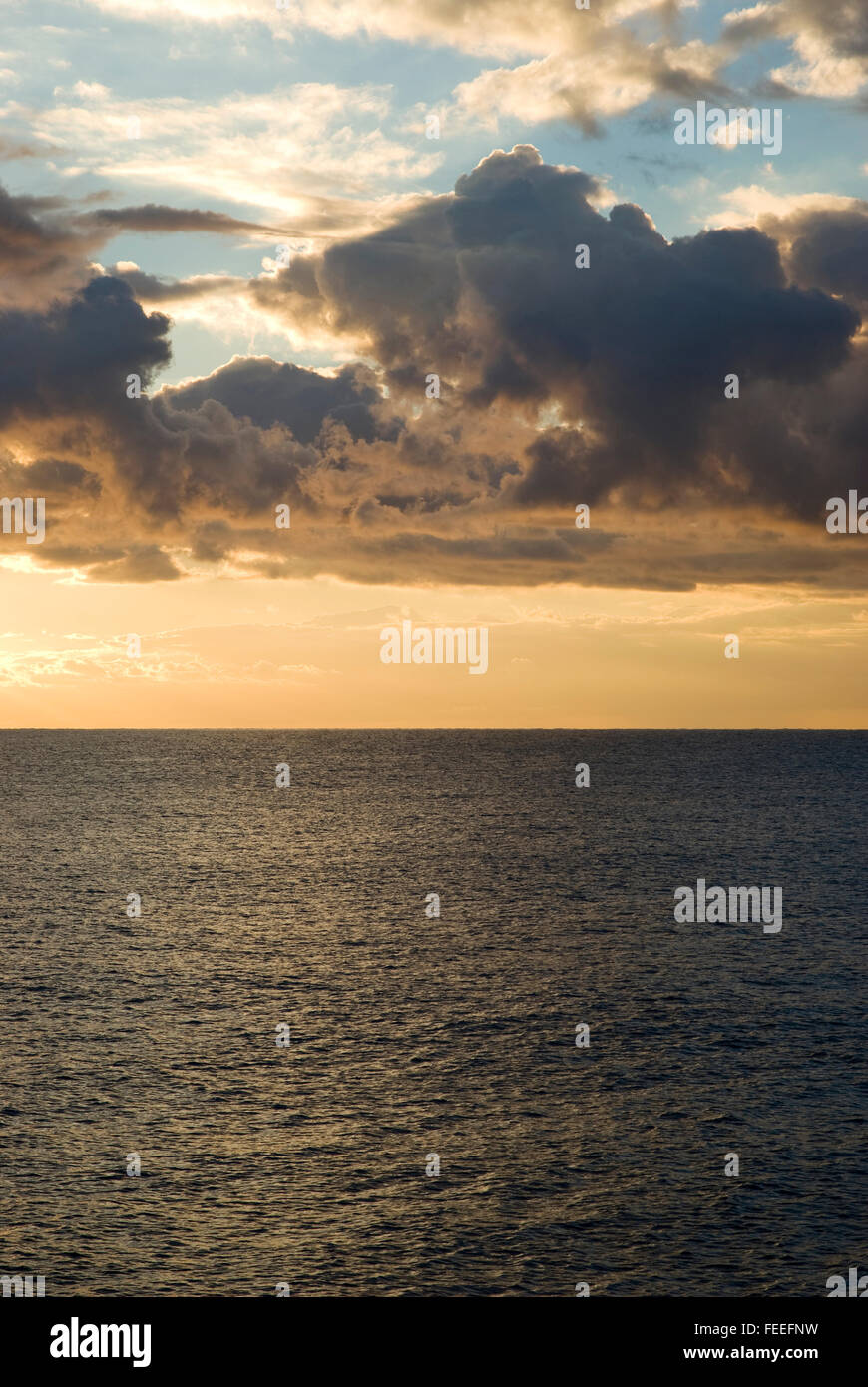 Dark cumulus clouds hovering over the sea Stock Photo - Alamy