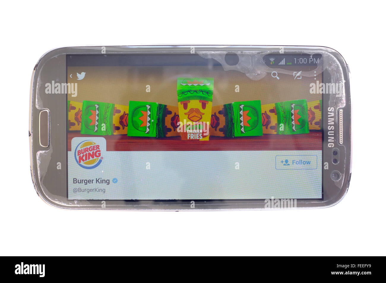 The Burger King Twitter page on a smartphone screen photographed ...