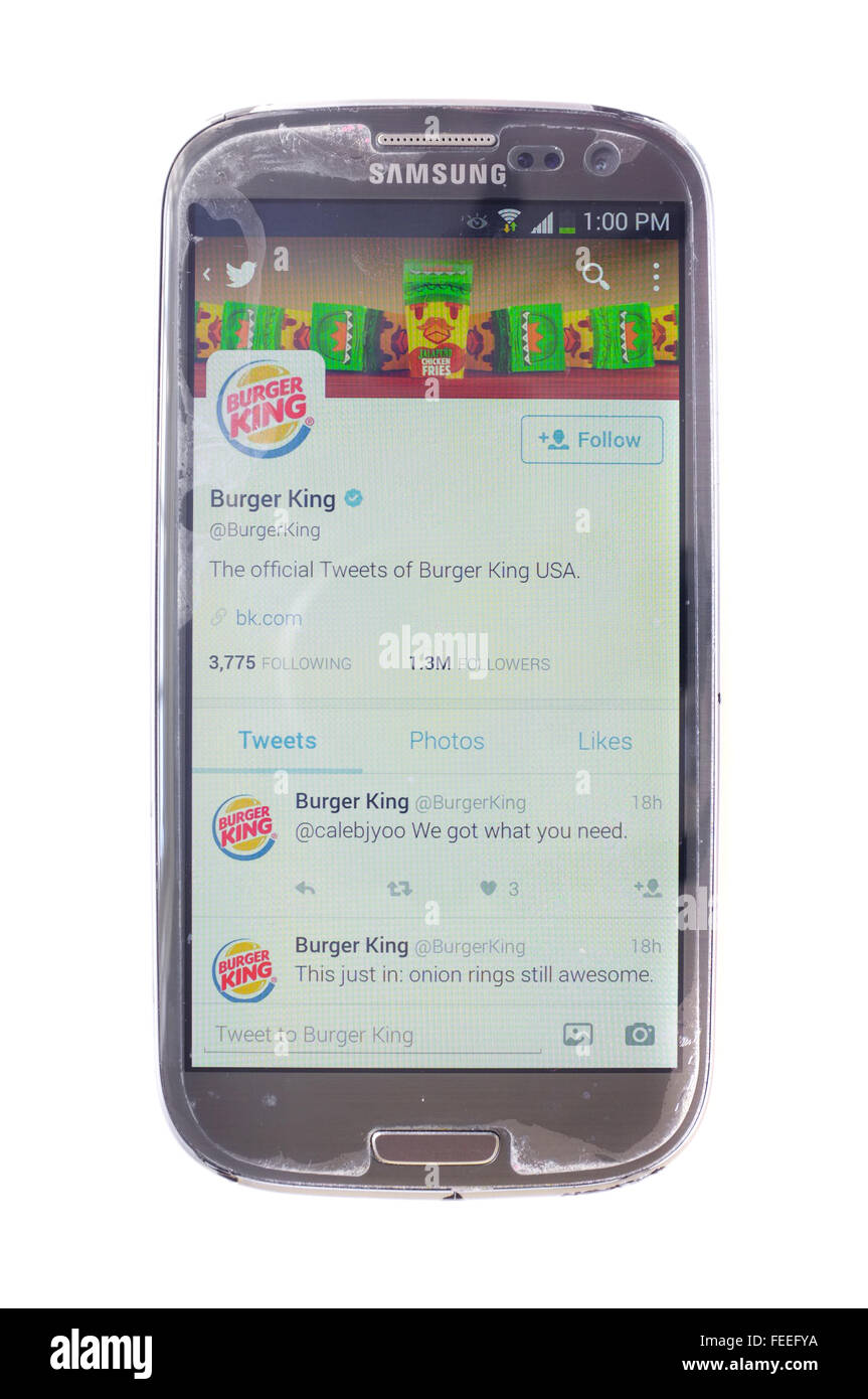 The Burger King Twitter page on a smartphone screen photographed ...