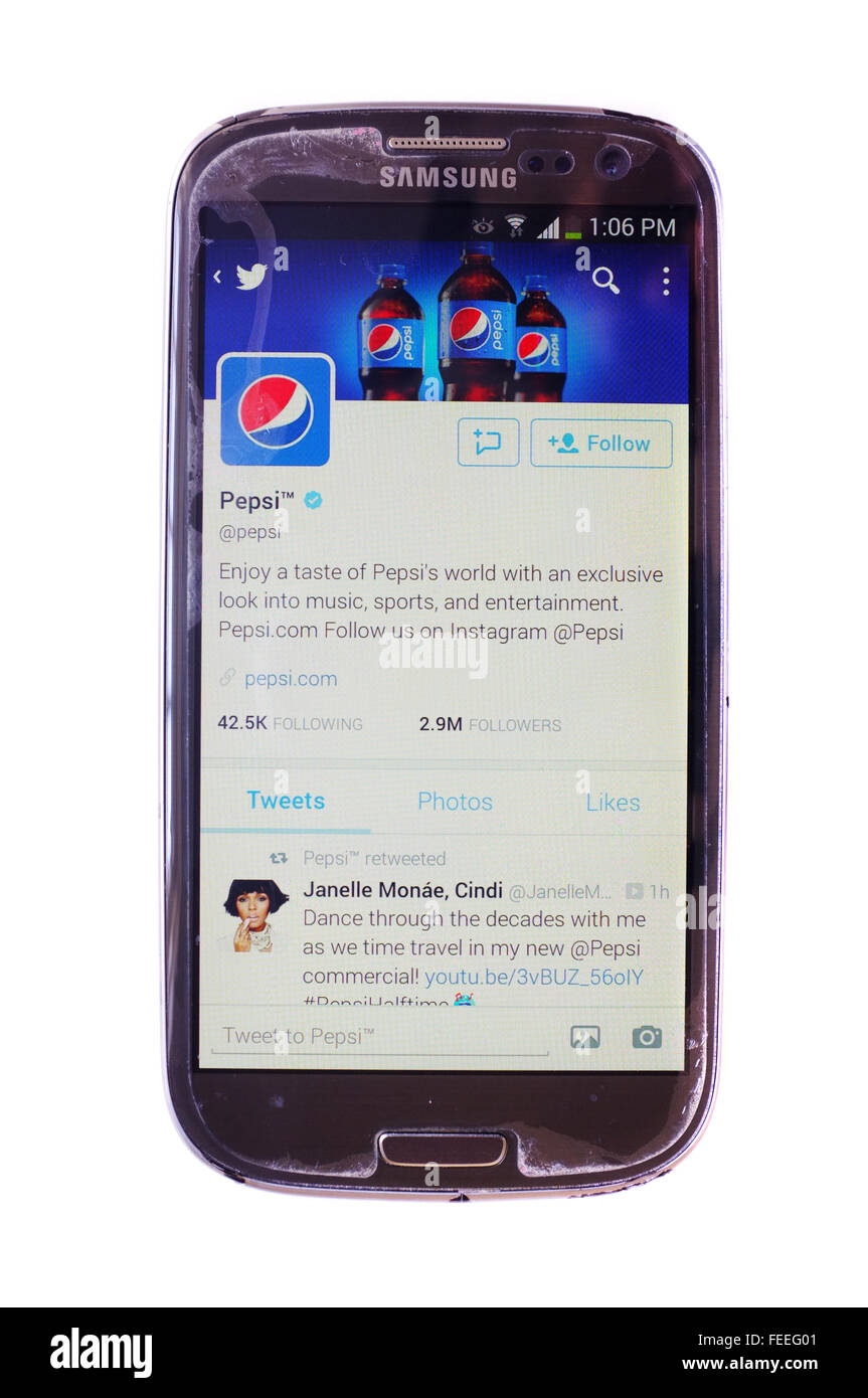 The Pepsi Twitter account on the screen of a smartphone photographed ...