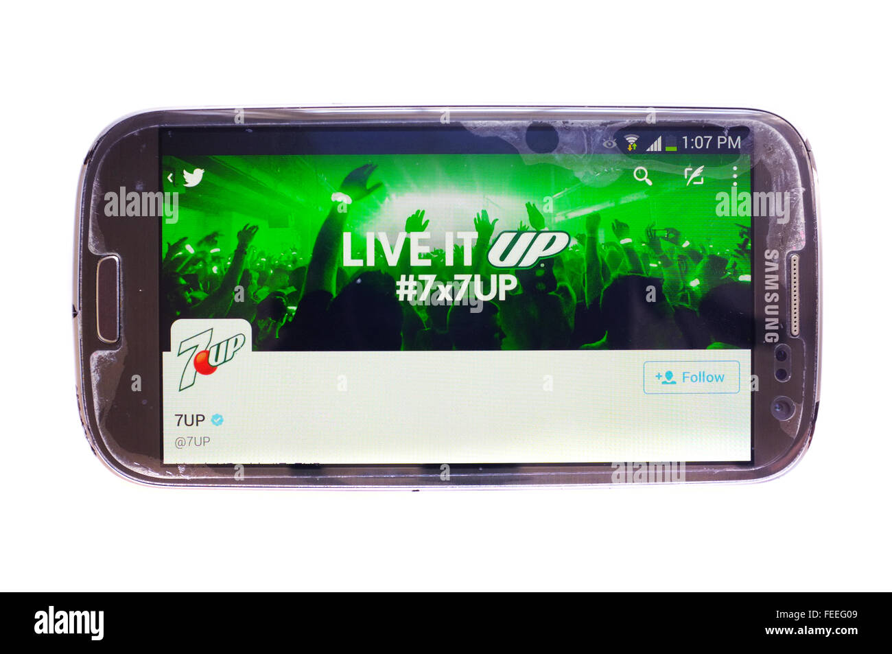 The 7Up Twitter account on the screen of a smartphone photographed ...
