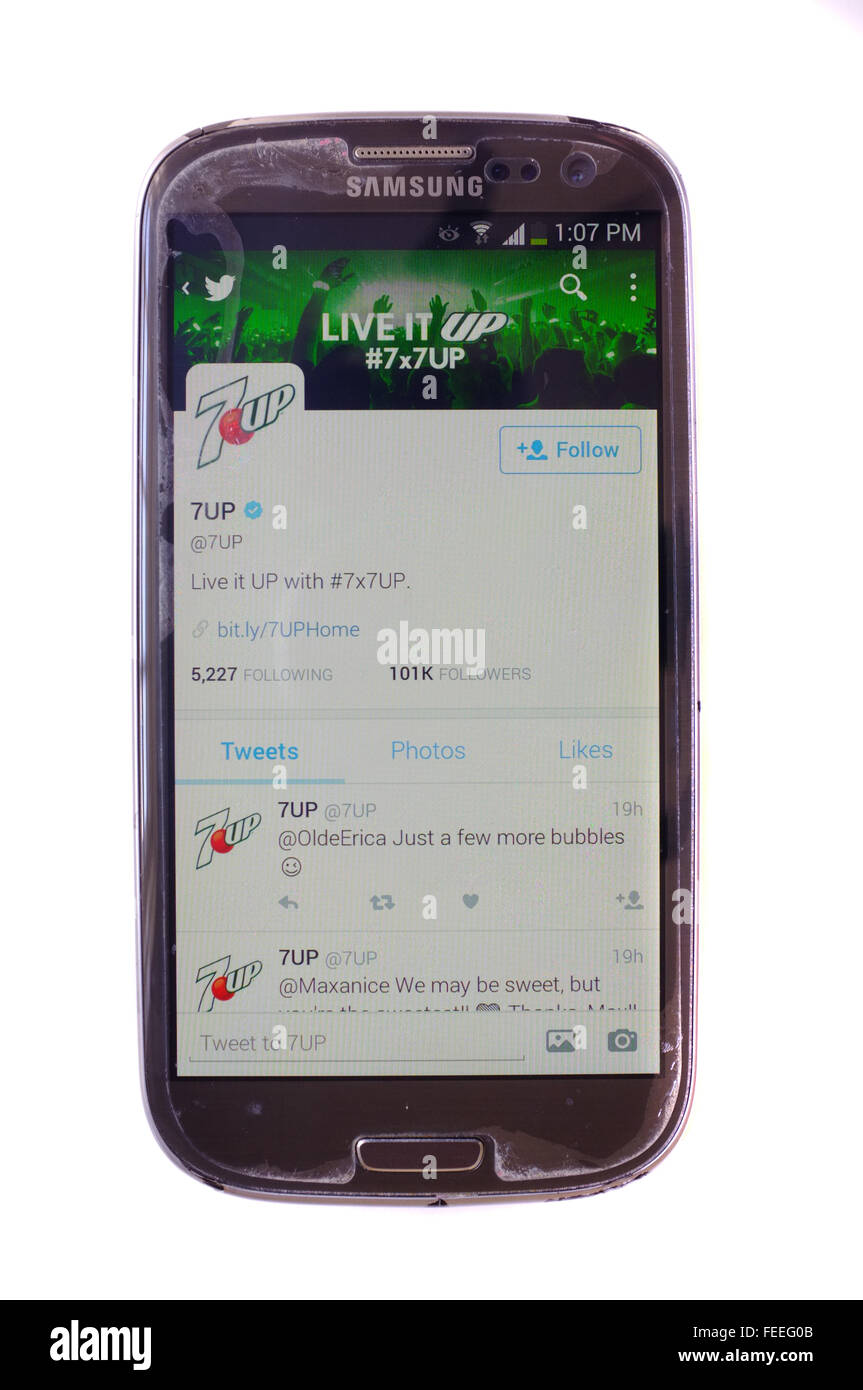 The 7Up Twitter account on the screen of a smartphone photographed ...