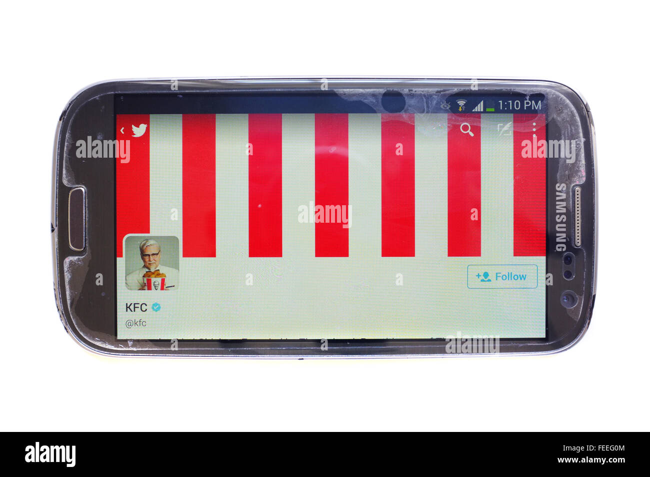 The KFC Twitter account on the screen of a smartphone photographed ...