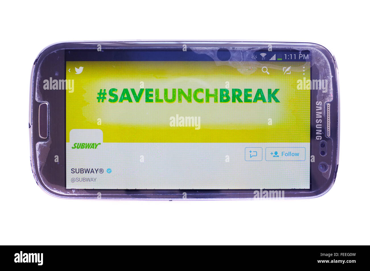 The Subway Twitter account on the screen of a smartphone photographed ...