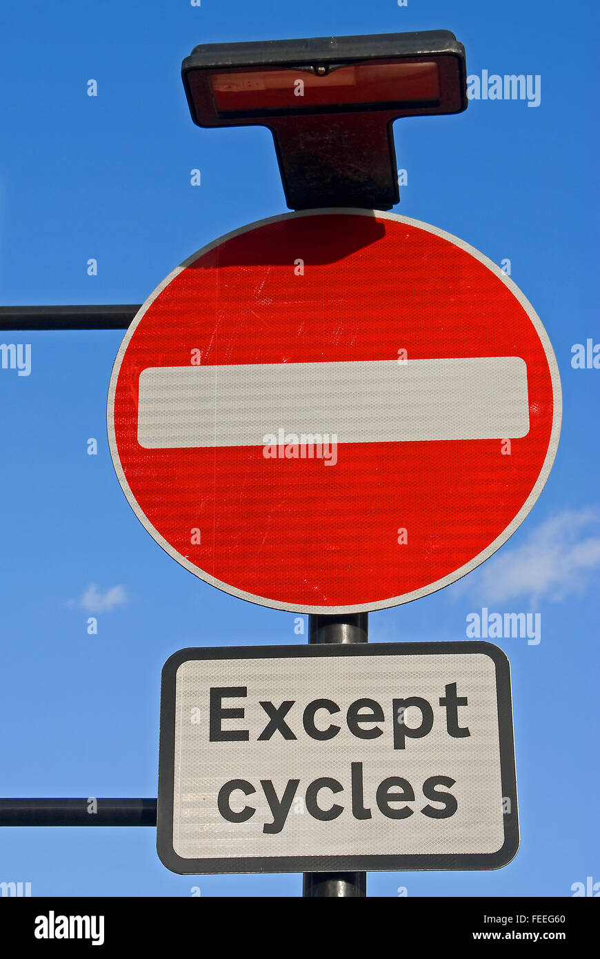 No Entry road sign with Except Cycles plate underneath Stock Photo - Alamy