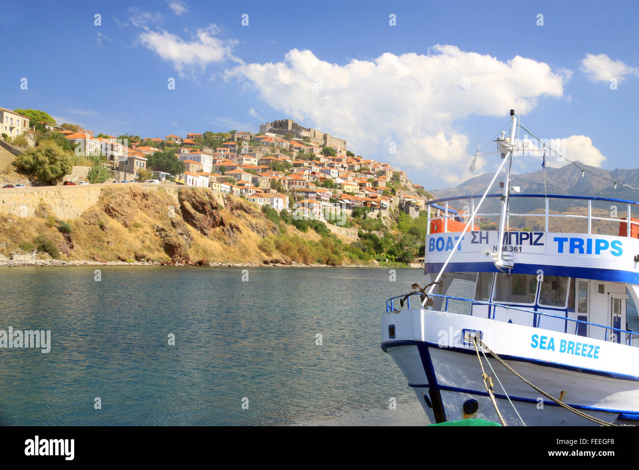 Boats in the Harbour with the medieval Greek castle of Mithymna on the ...