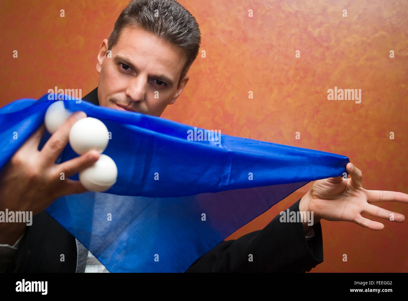 Performing a magic trick hi-res stock photography and images - Alamy