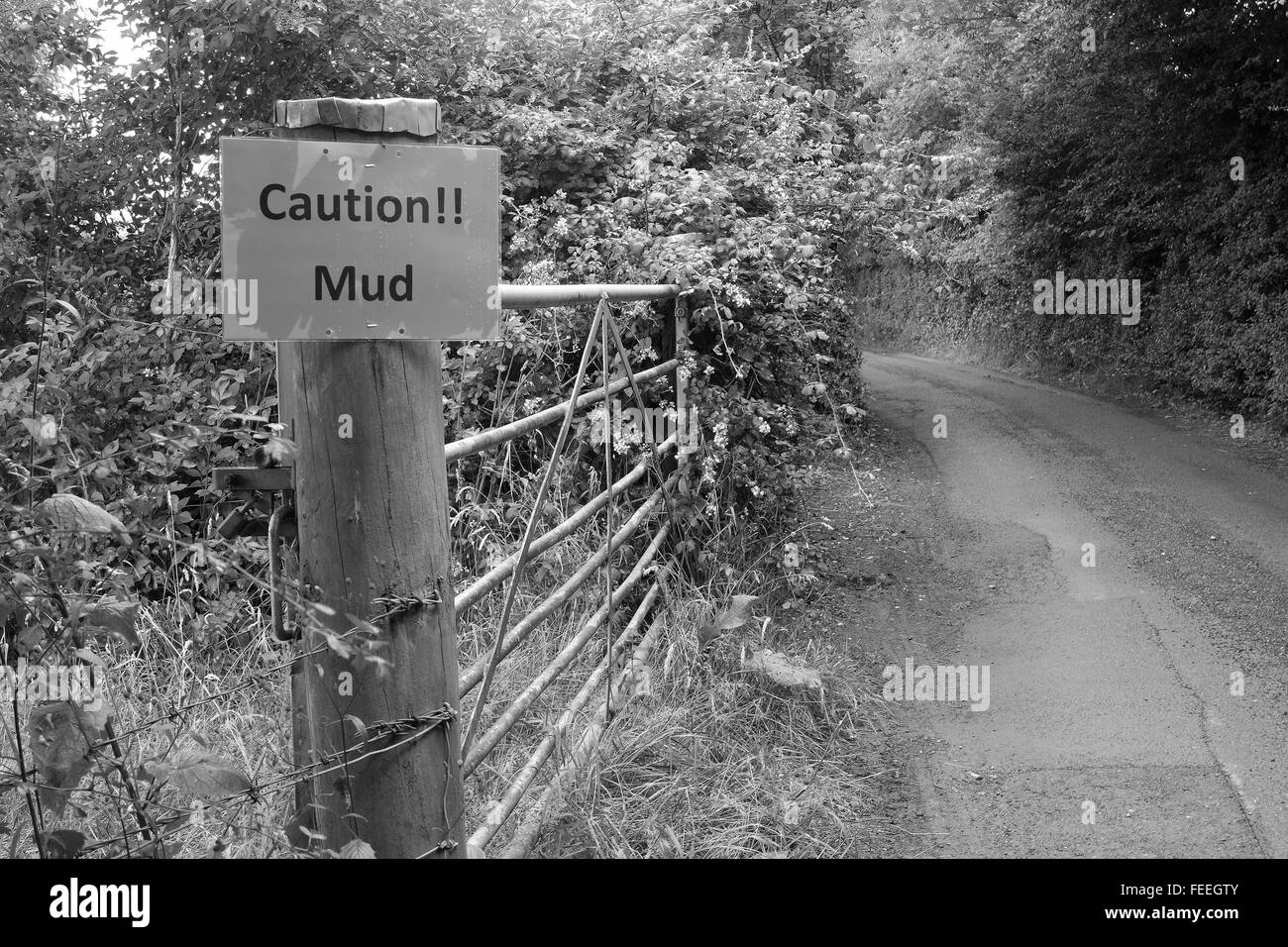 Mud on road sign on a rural gate post on a quiet country lane Stock ...