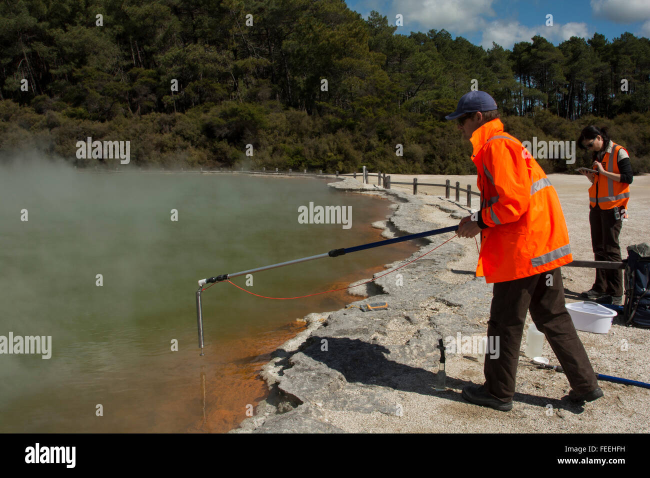 GNS scientists Matt Stott and Jean Power sampling microorganisms from ...