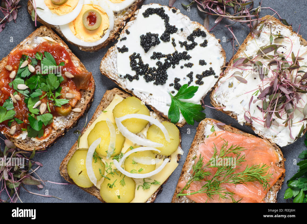 group open sandwiches on table Stock Photo - Alamy