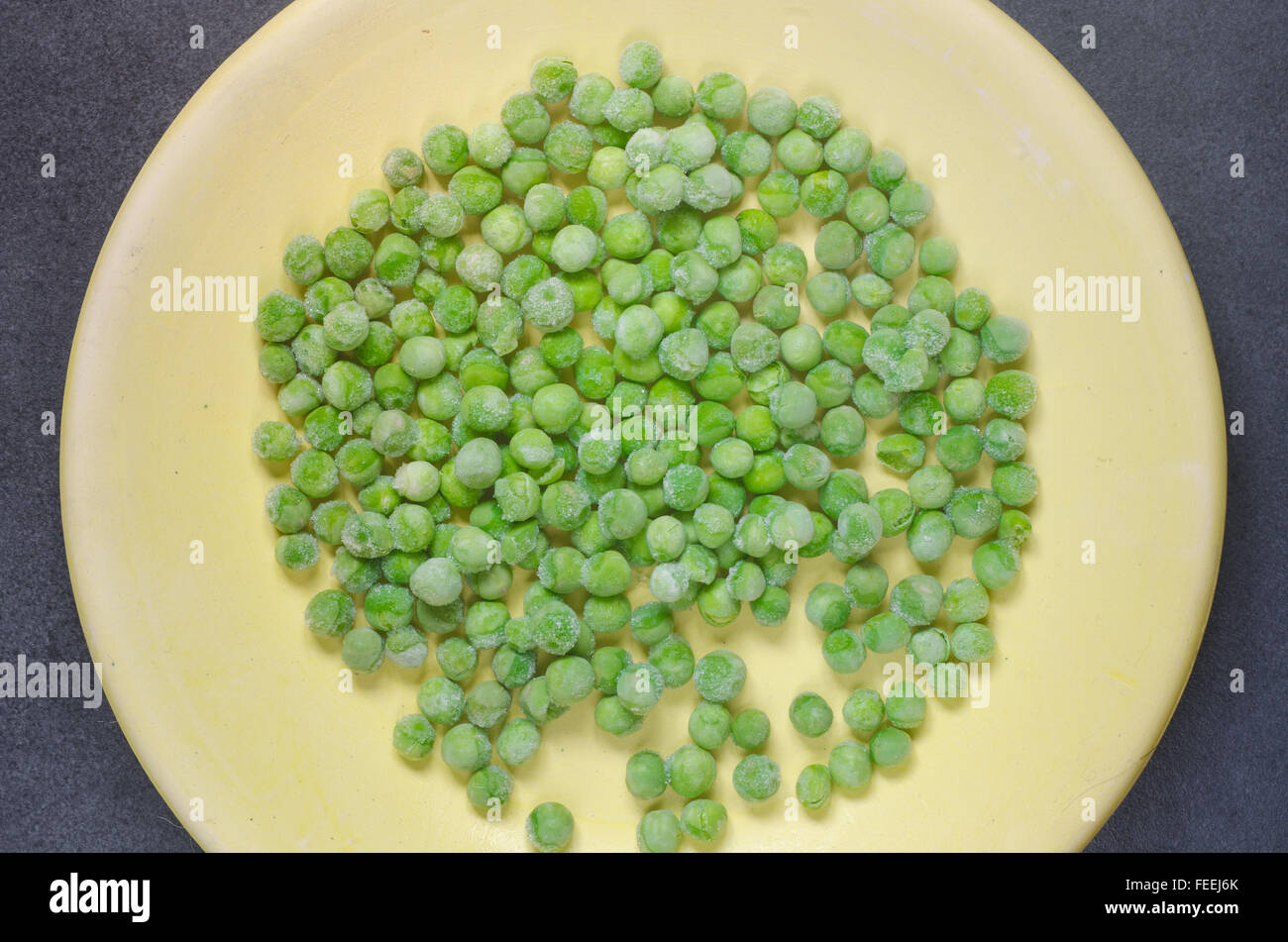 frozen green peas on plate Stock Photo - Alamy