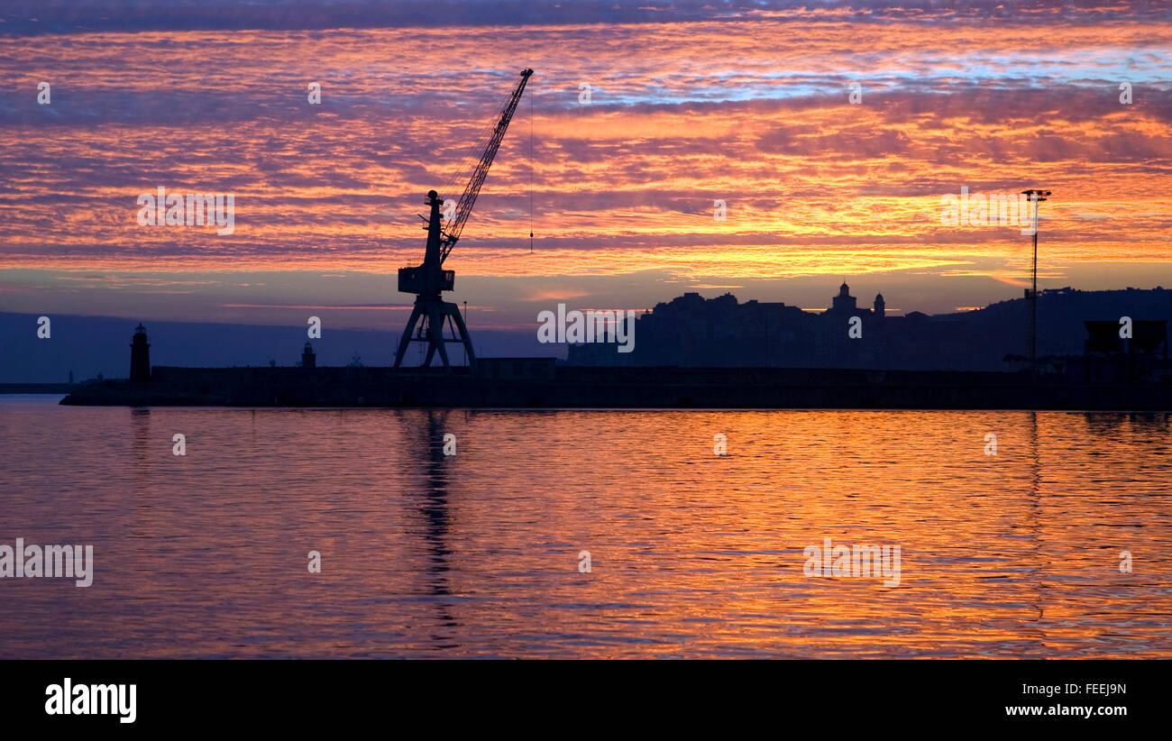Italian Riviera. Sunset in clouds sky Stock Photo - Alamy