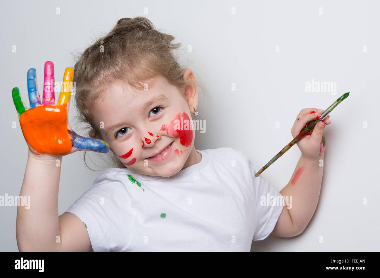little girl funny with bright colors Stock Photo - Alamy