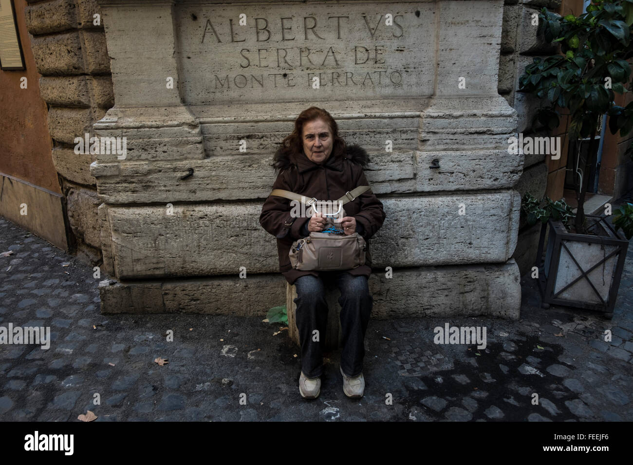 Rome, Italy. 05th Feb, 2016. A worshipper takes a rest before taking ...