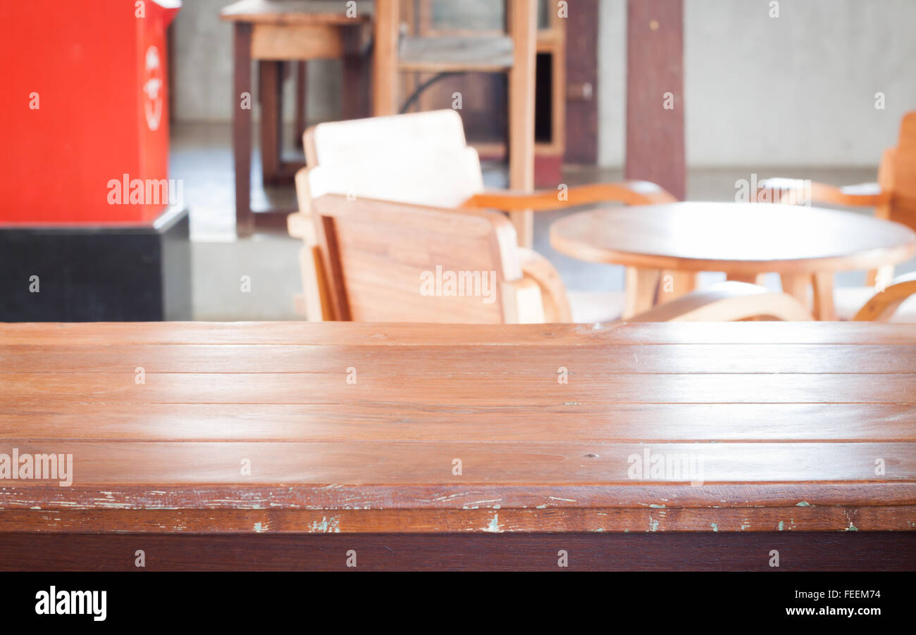 Empty wooden table in coffee shop, stock photo Stock Photo - Alamy