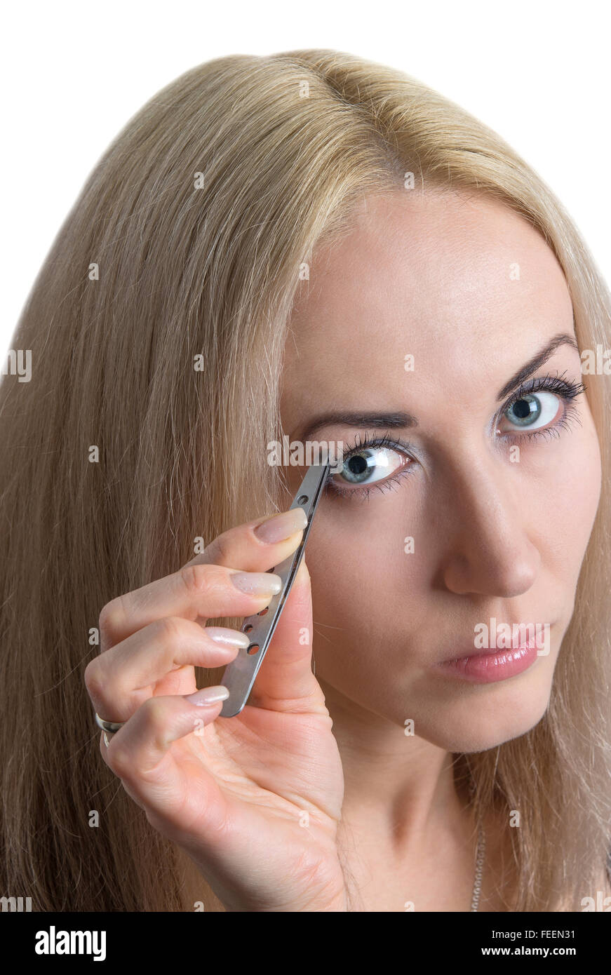 woman pluck her eyebrows Stock Photo - Alamy
