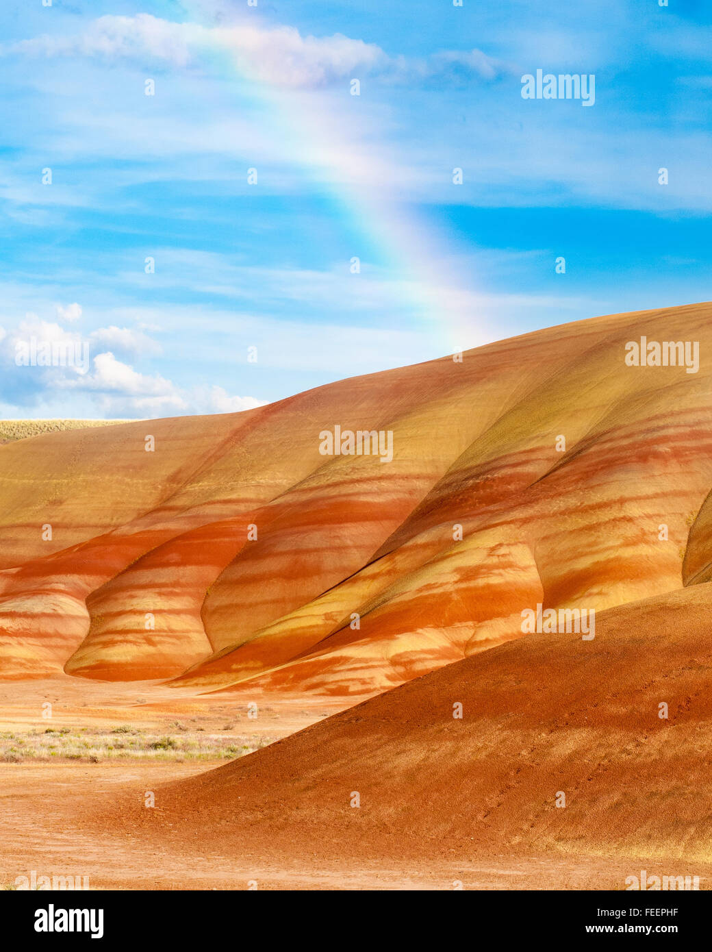 A rainbow crosses the sky above the Painted Hills. Oregon, USA Stock ...