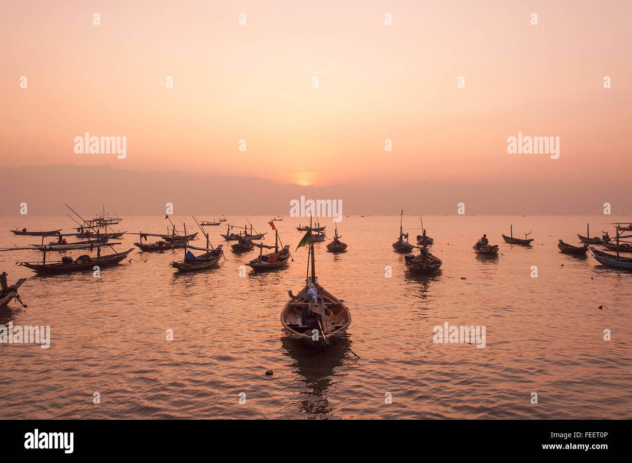 Golden sunrise at Kenjeran Beach, Surabaya, Indonesia with the ...