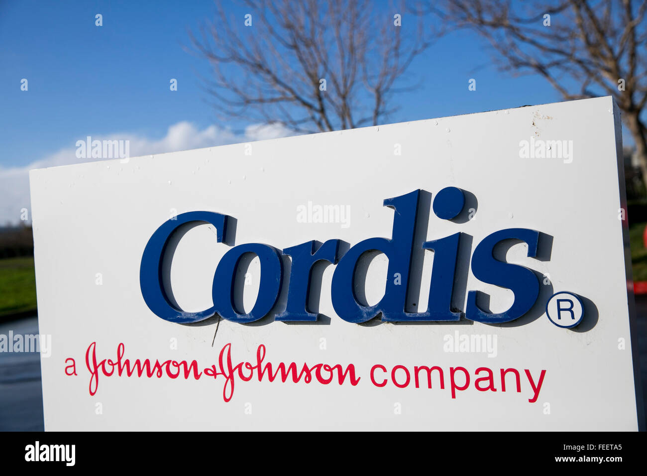 A logo sign outside of a facility occupied by the Cordis Corporation in ...