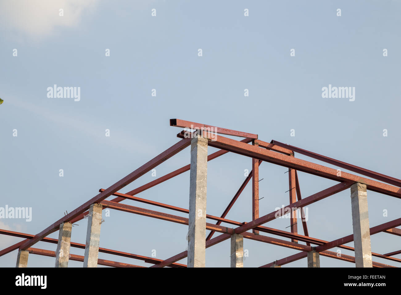 structural steel beam on roof of building residential construction with ...