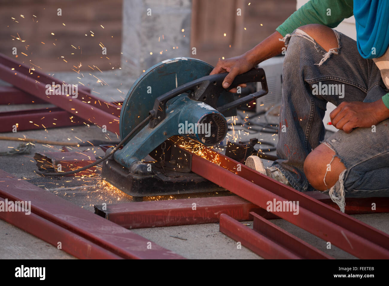 Cutting Steel channel (steel C chanel) with grinder. Sparks while ...