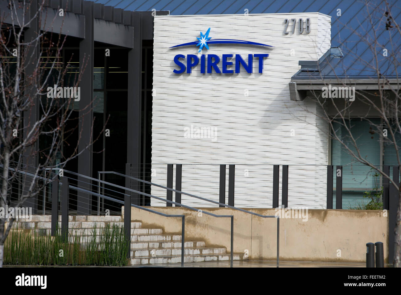 A logo sign outside of a facility occupied by Spirent in San Jose ...