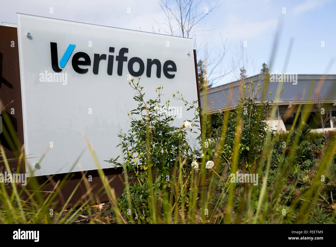 A logo sign outside of the headquarters of Verifone in San Jose ...
