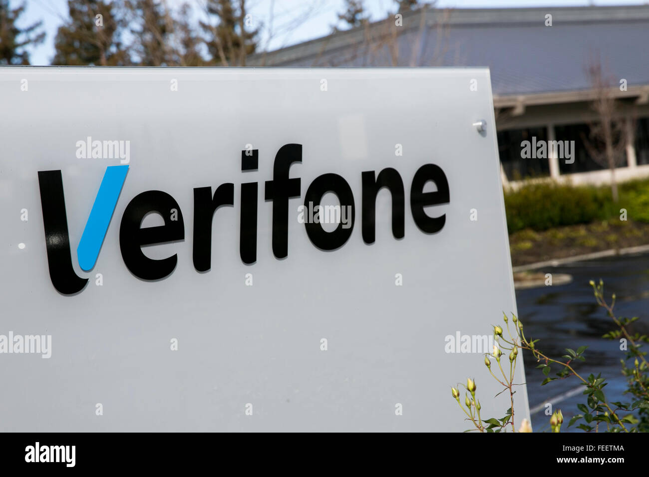 A logo sign outside of the headquarters of Verifone in San Jose ...