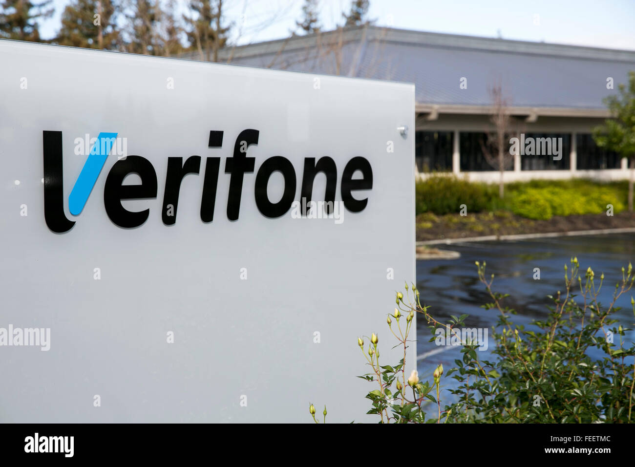 A logo sign outside of the headquarters of Verifone in San Jose ...