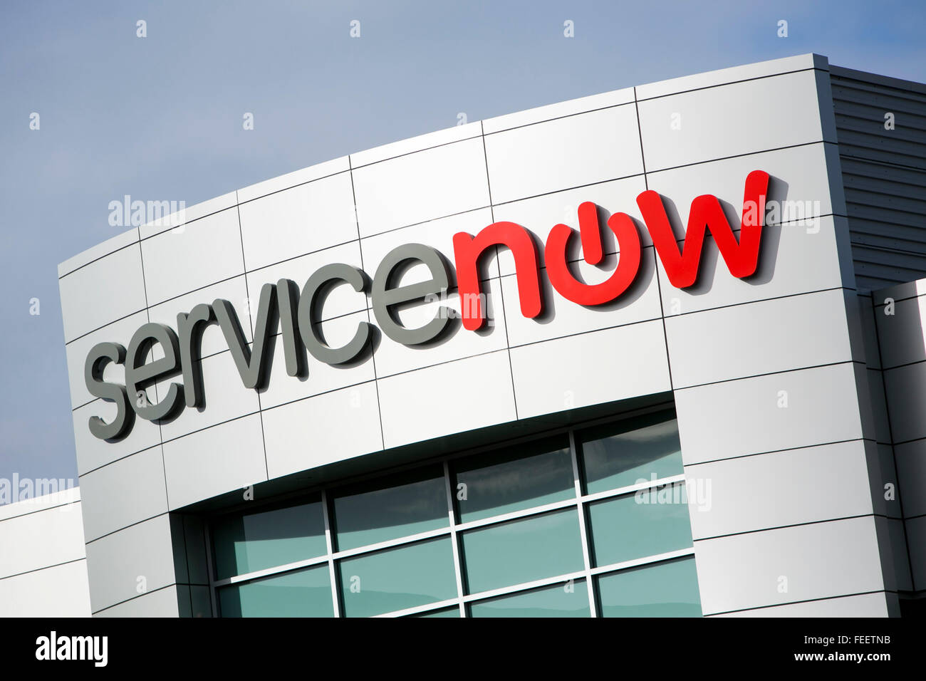 A logo sign outside of the headquarters of ServiceNow in Santa Clara ...