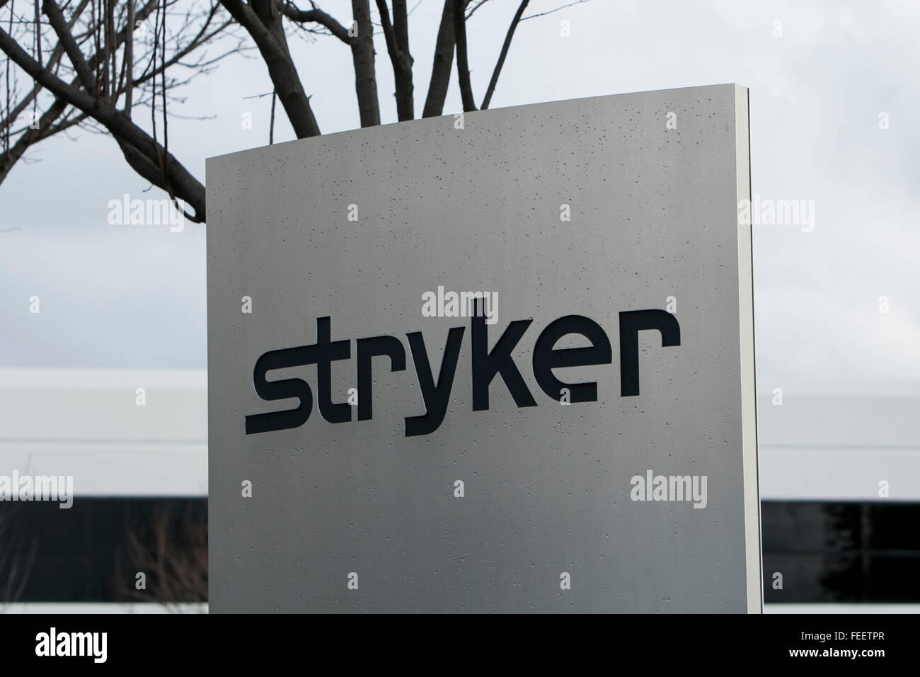 A logo sign outside of a facility occupied by the Stryker Corporation ...