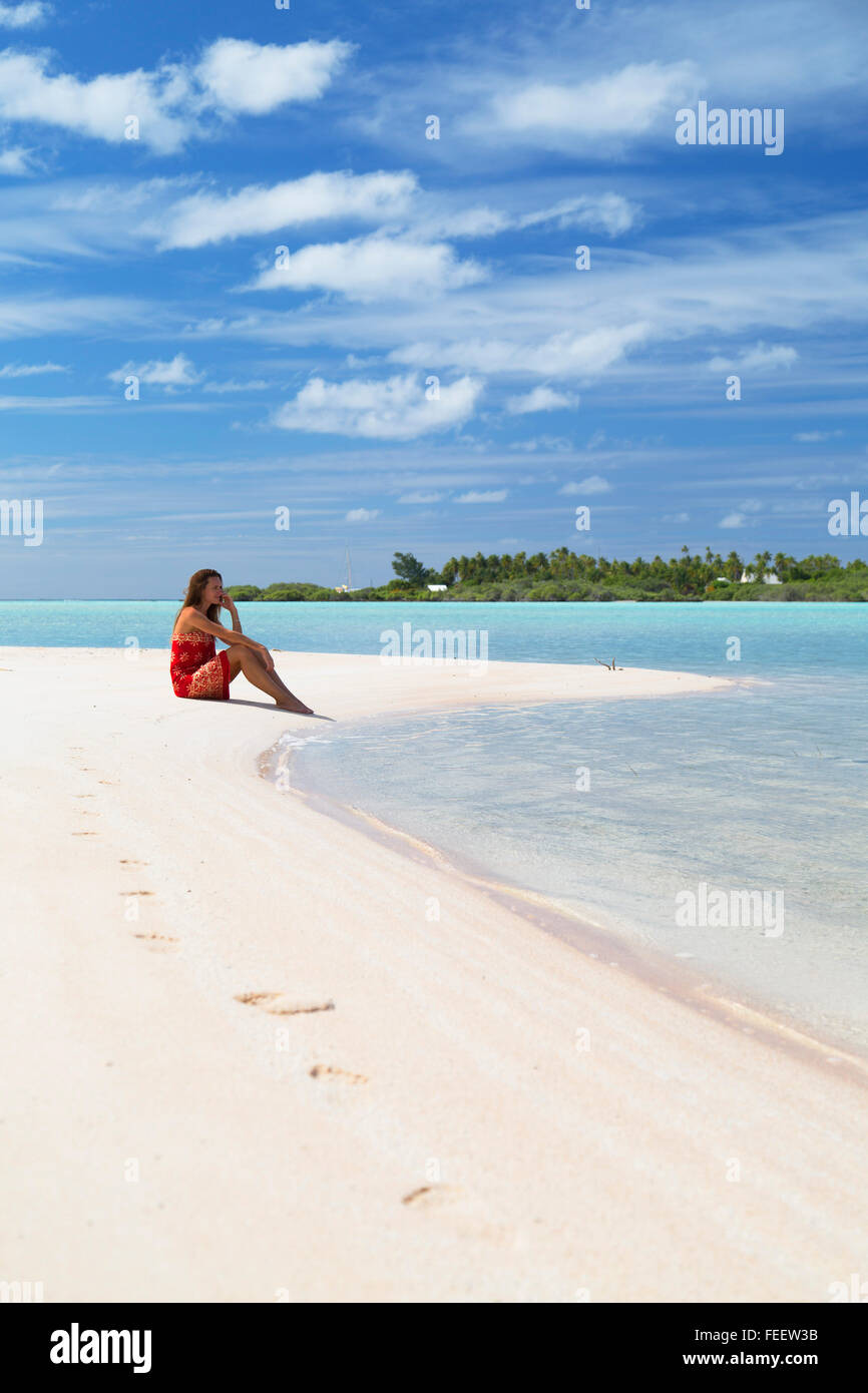 Woman on beach at Les Sables Roses (Pink Sands), Tetamanu, Fakarava ...