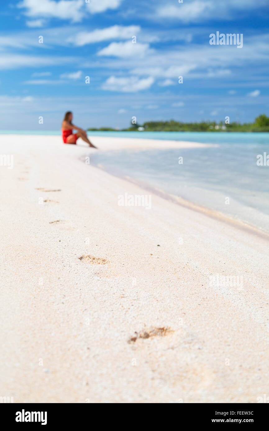 Woman on beach at Les Sables Roses (Pink Sands), Tetamanu, Fakarava ...
