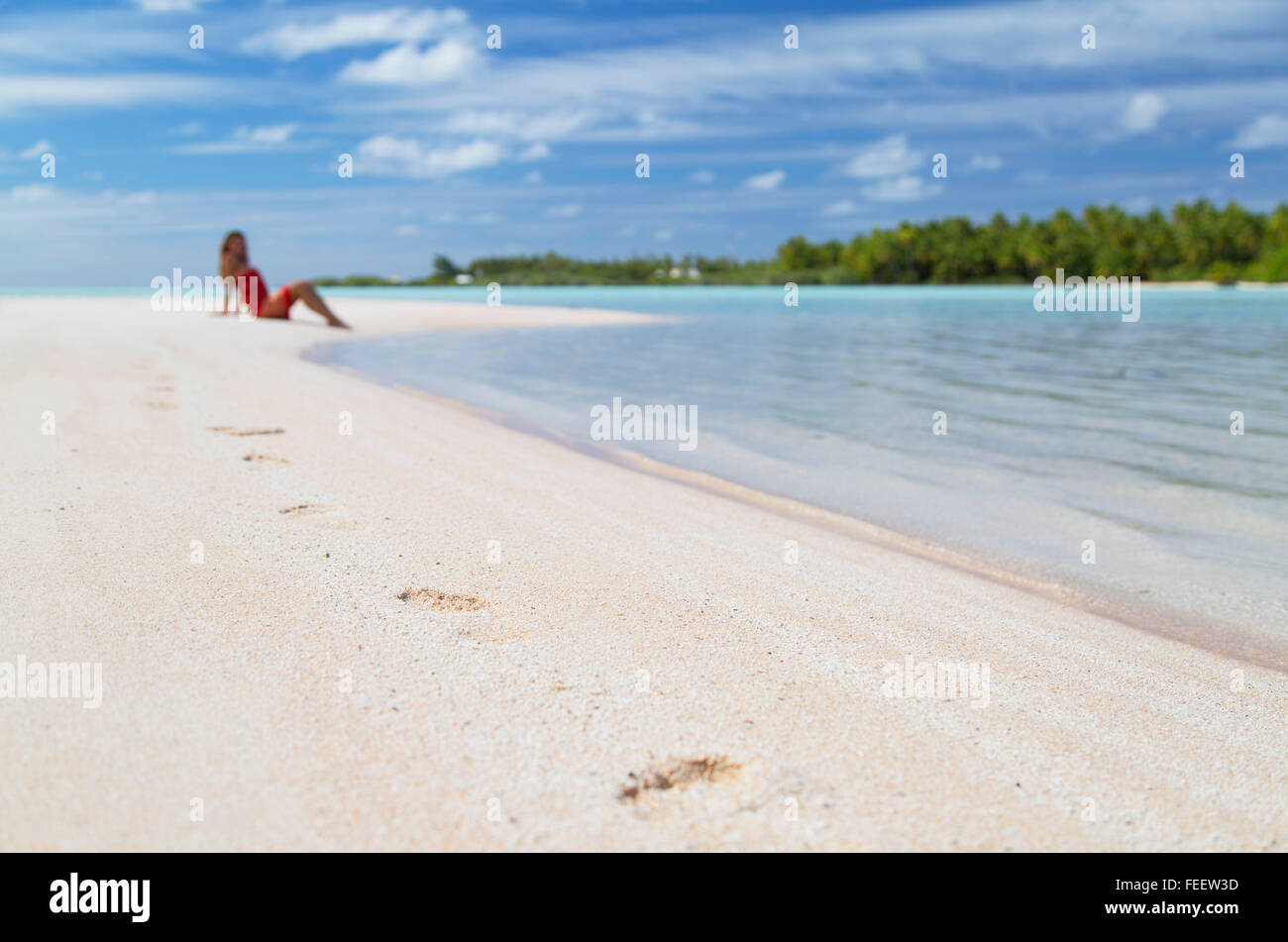Woman on beach at Les Sables Roses (Pink Sands), Tetamanu, Fakarava ...