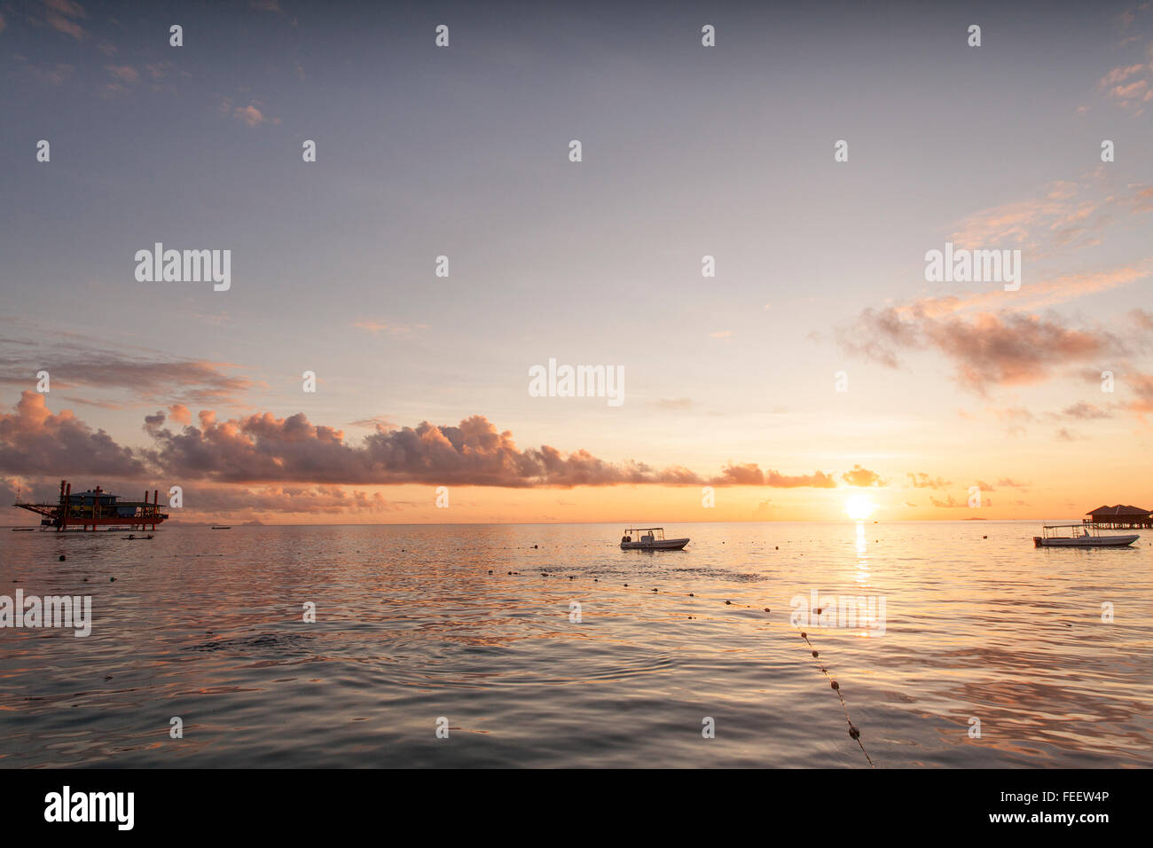 Image of Mabul Island Semporna, Sabah during sunrise with calm water ...