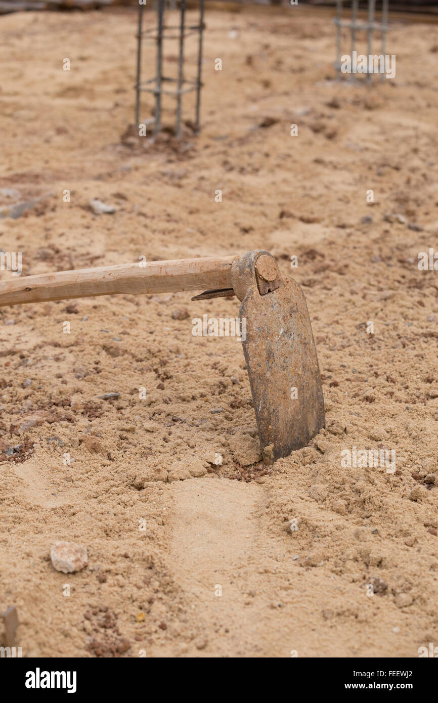 soil with a hoe at construction site Stock Photo - Alamy