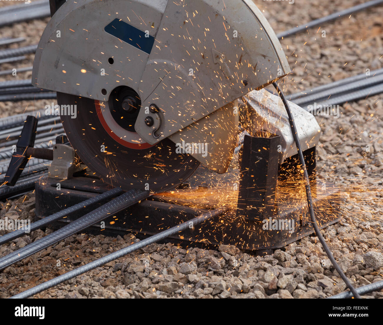 Cutting metal with grinder. Sparks while grinding iron Stock Photo - Alamy