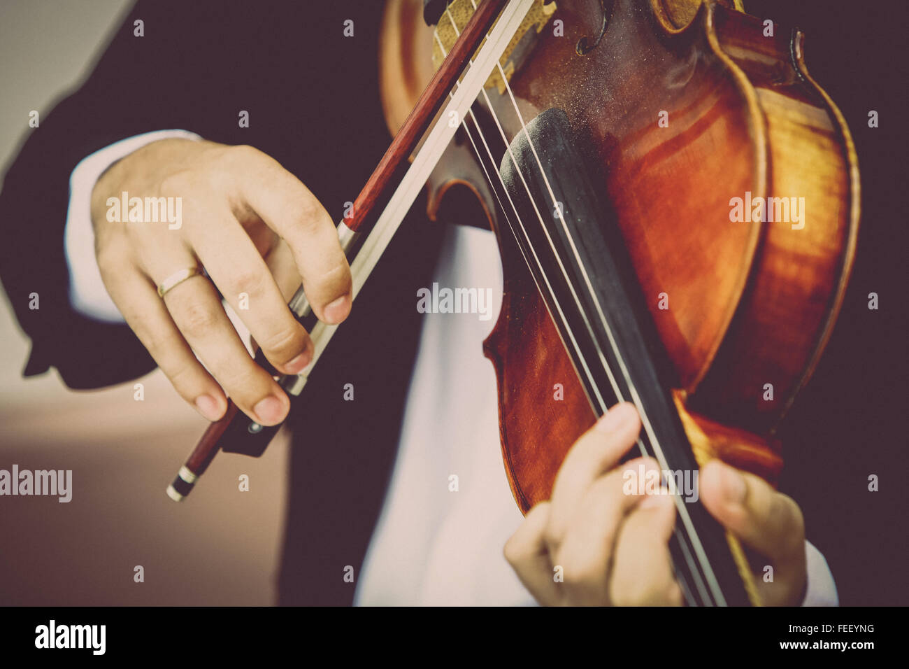 Detail of viola being played by a musician Stock Photo - Alamy