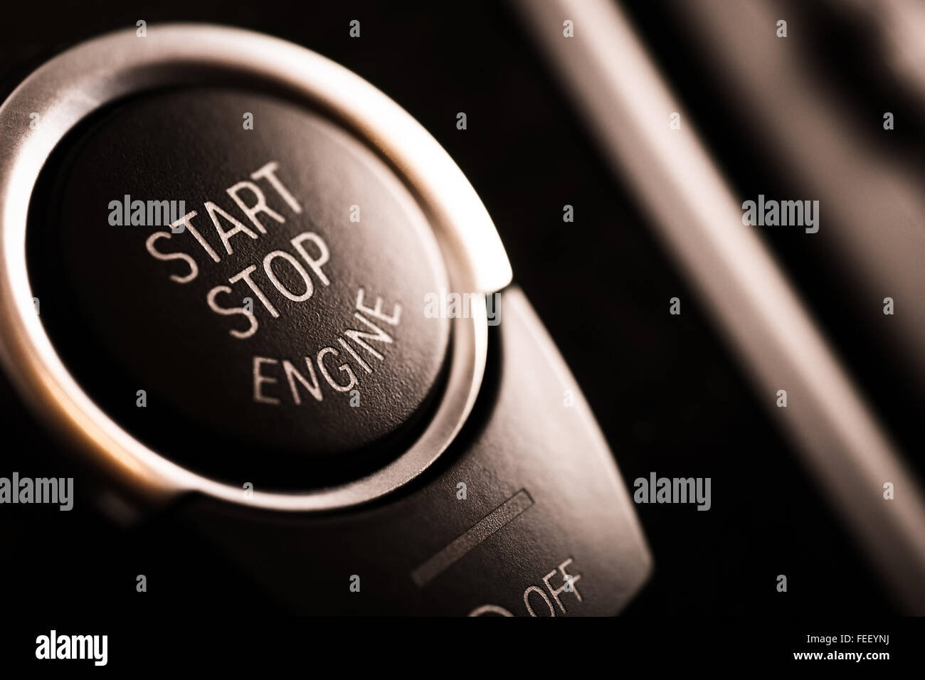 Detail on the start button in a car Stock Photo - Alamy