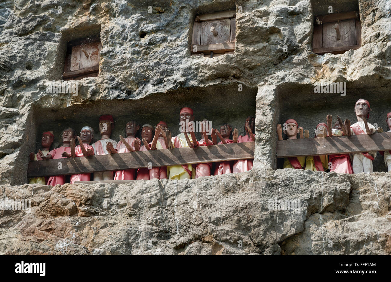 Wooden Statues Of Tau Tau are representatives of the deceased and guard ...