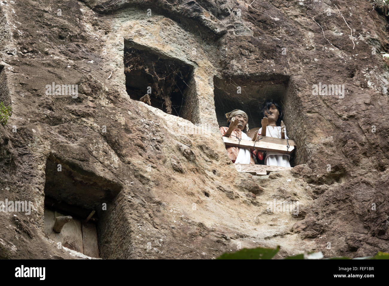 Wooden Statues Of Tau Tau are representatives of the deceased and guard ...
