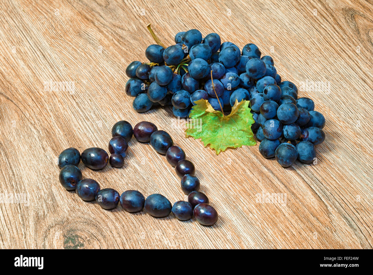 Grape bunch heart shaped hi-res stock photography and images - Alamy