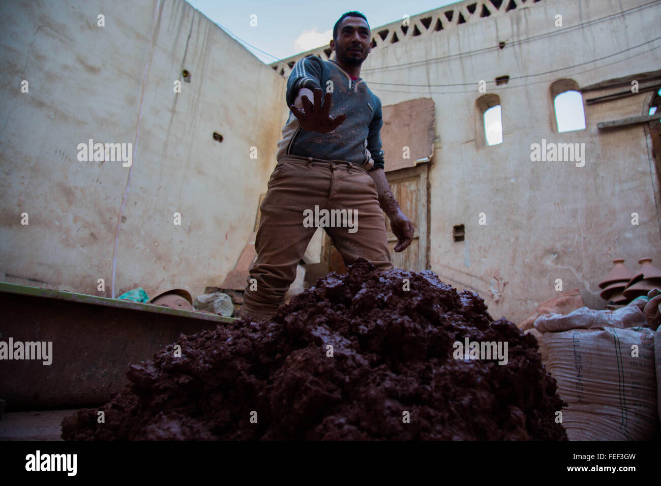 Cairo, Egypt. 2nd Feb, 2016. An Egyptian man works at a pottery ...