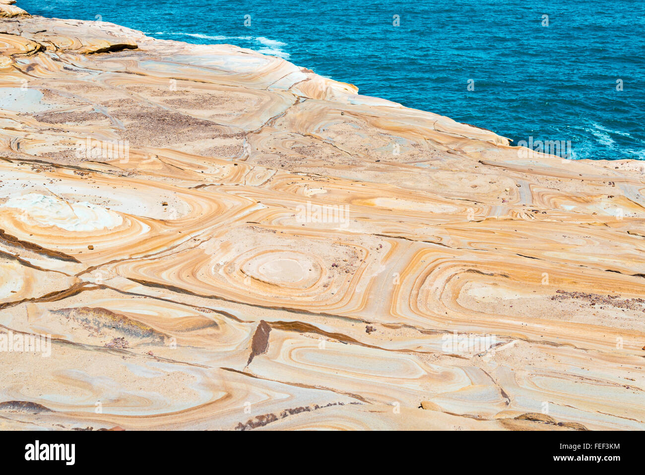 Australian rock formation background, sandstone texture with iron ...