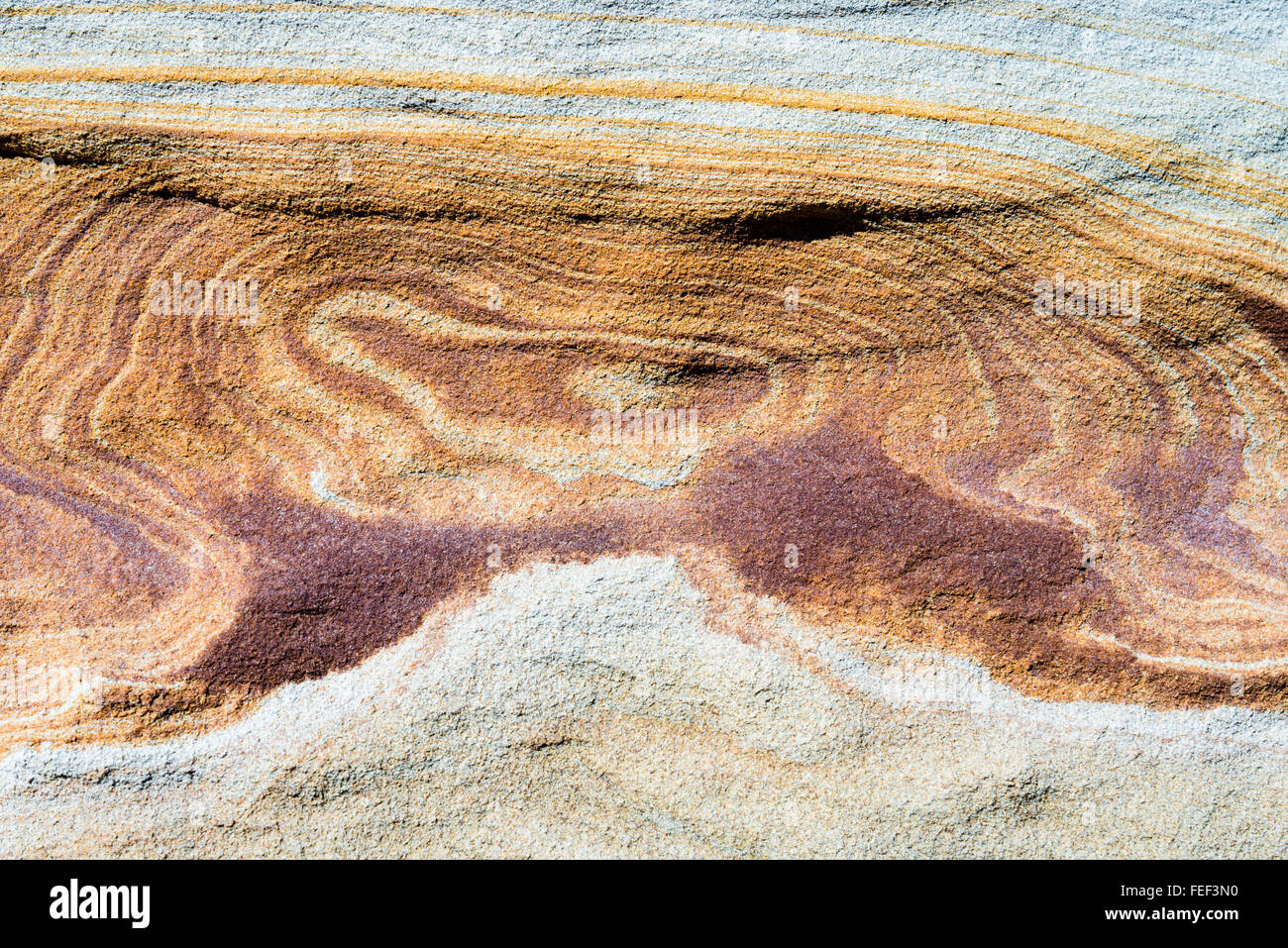 Australian rock formation background, sandstone texture with iron ...