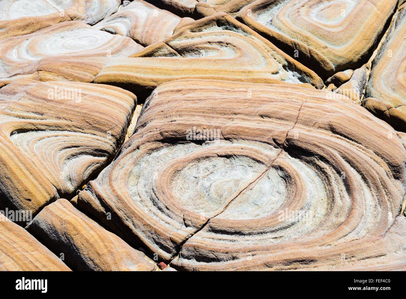 Australian rock formation background, sandstone texture with iron ...