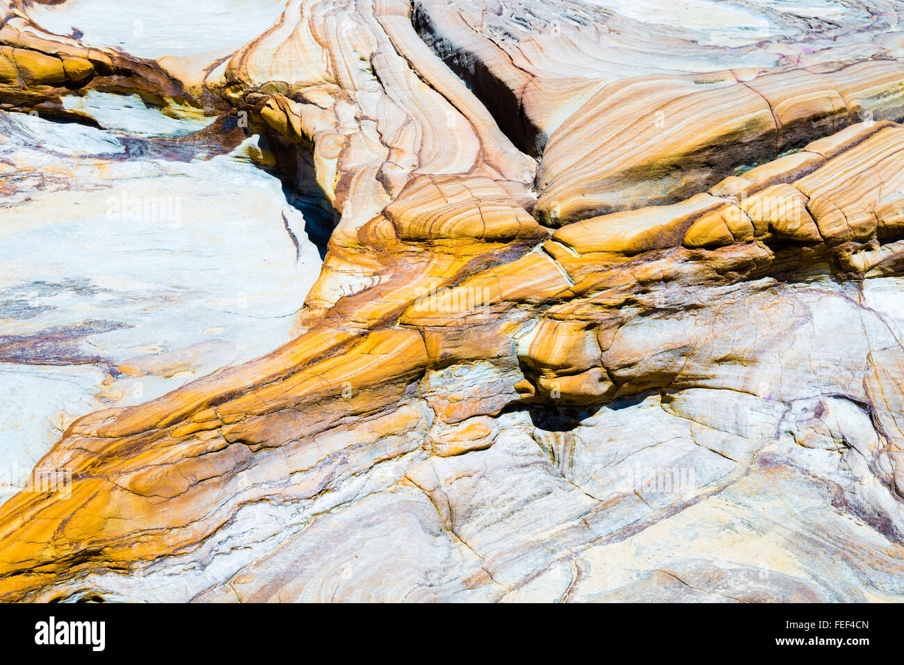 Australian rock formation background, sandstone texture with iron ...