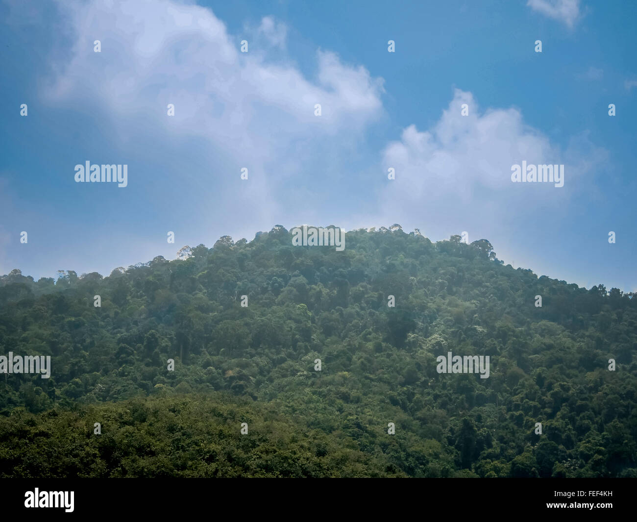 Mountain with clouds overhead Stock Photo - Alamy