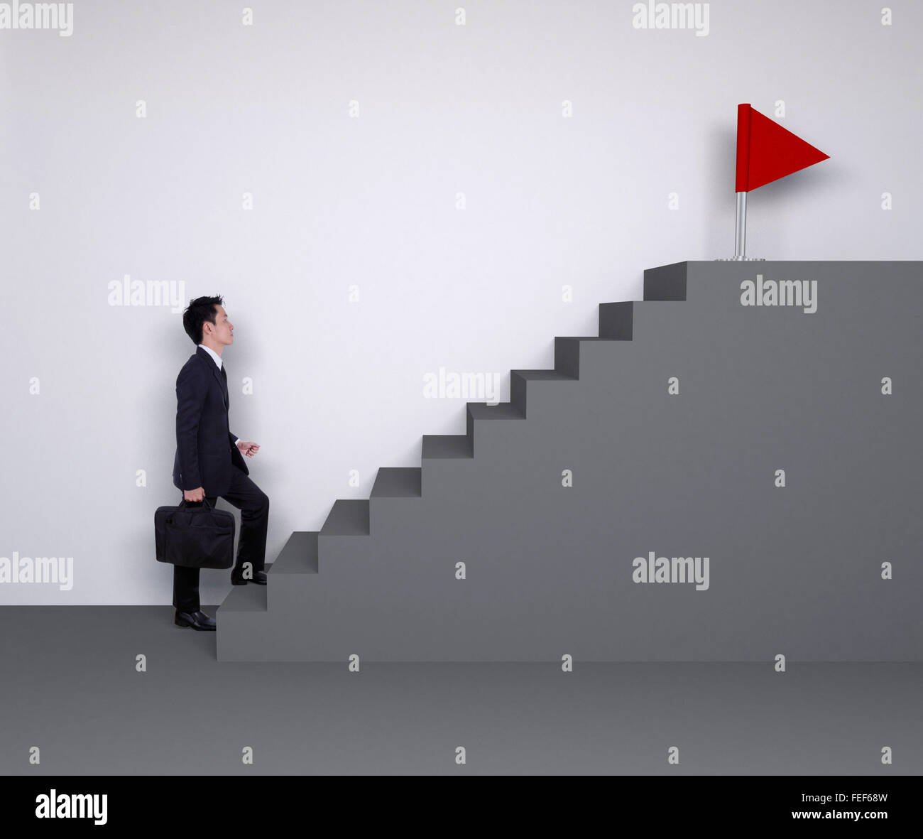 Business man stepping up on stairs to red flag (business success ...