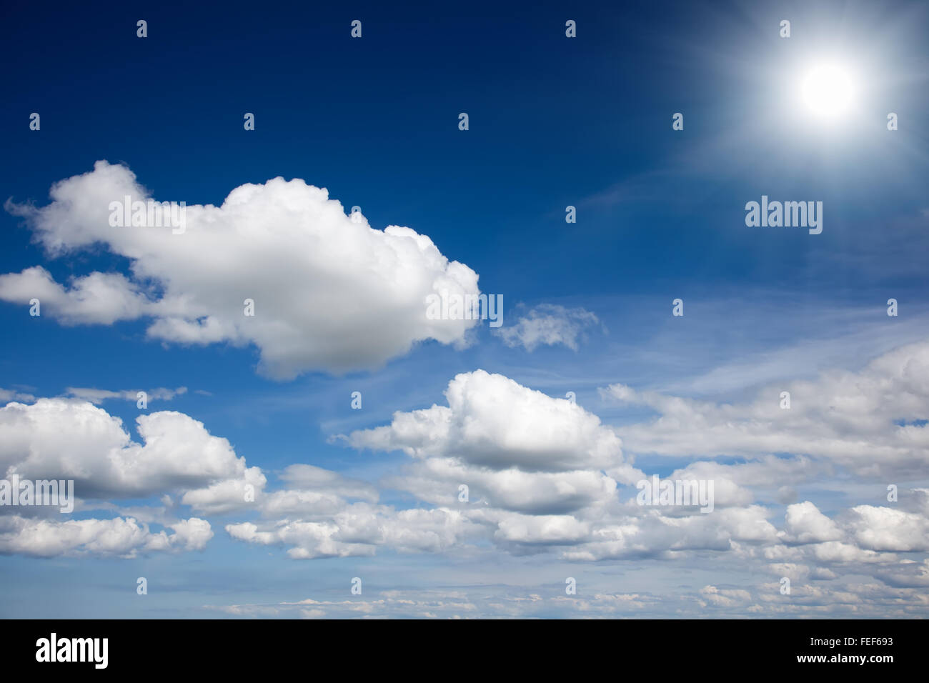 Sunny sky with white clouds Stock Photo - Alamy